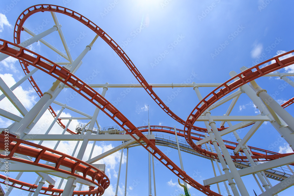 Roller coaster lines in blue sky Stock Photo | Adobe Stock