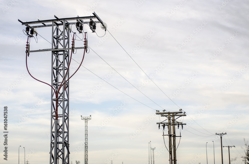 POSTES ELECTRICOS AL ATARDECER Stock Photo | Adobe Stock