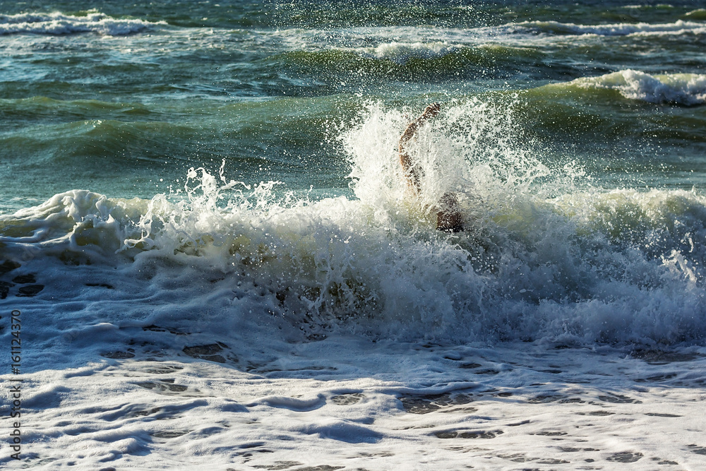 Hand of drowning man trying to swim out of the stormy ocean. Drowning ...
