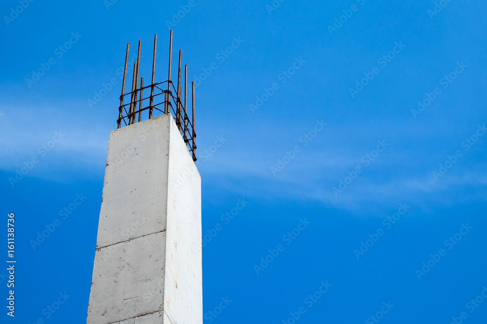 Reinforced concrete column structure in construction site with blue sky ...