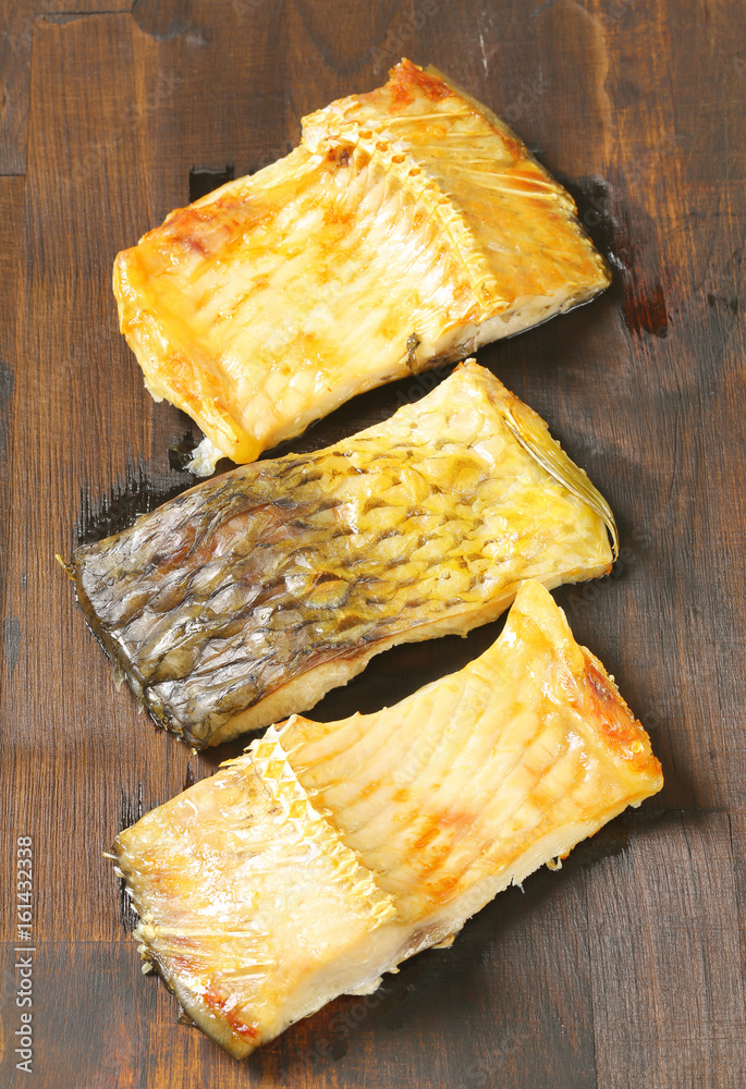 Oven baked carp fillets Stock Photo | Adobe Stock