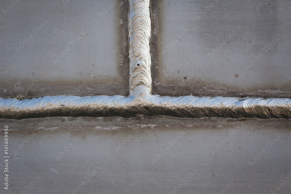 Stained steel plate with weld seam, industrial background texture Stock ...