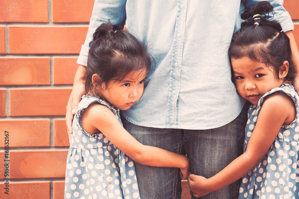 Two Sad Girls Hugging