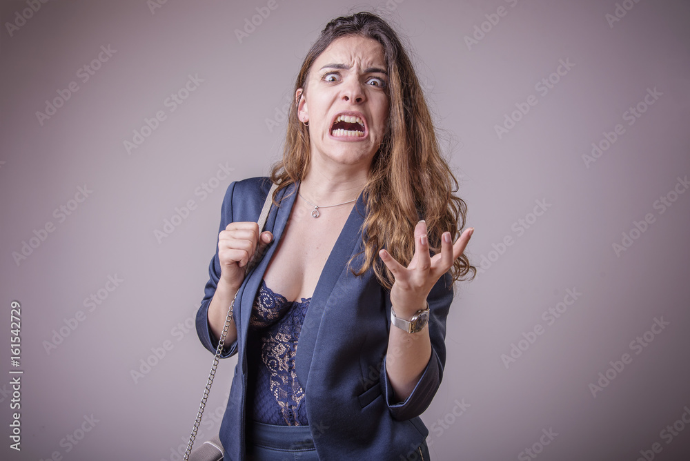 Classy angry woman shouting and yelling, furious and frustrated Stock ...