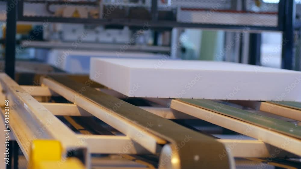 transport foam rubber on conveyor belt, heat-insulating material in ...