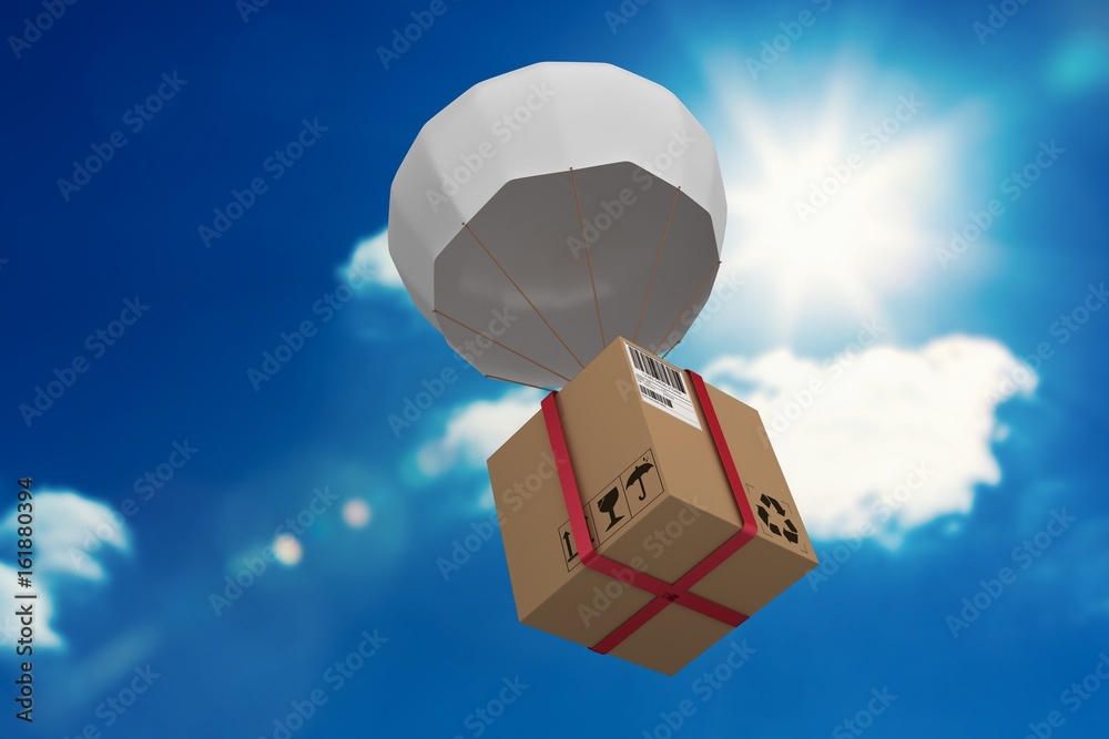 Composite 3d image of parachute carrying cardboard box Stock Photo ...
