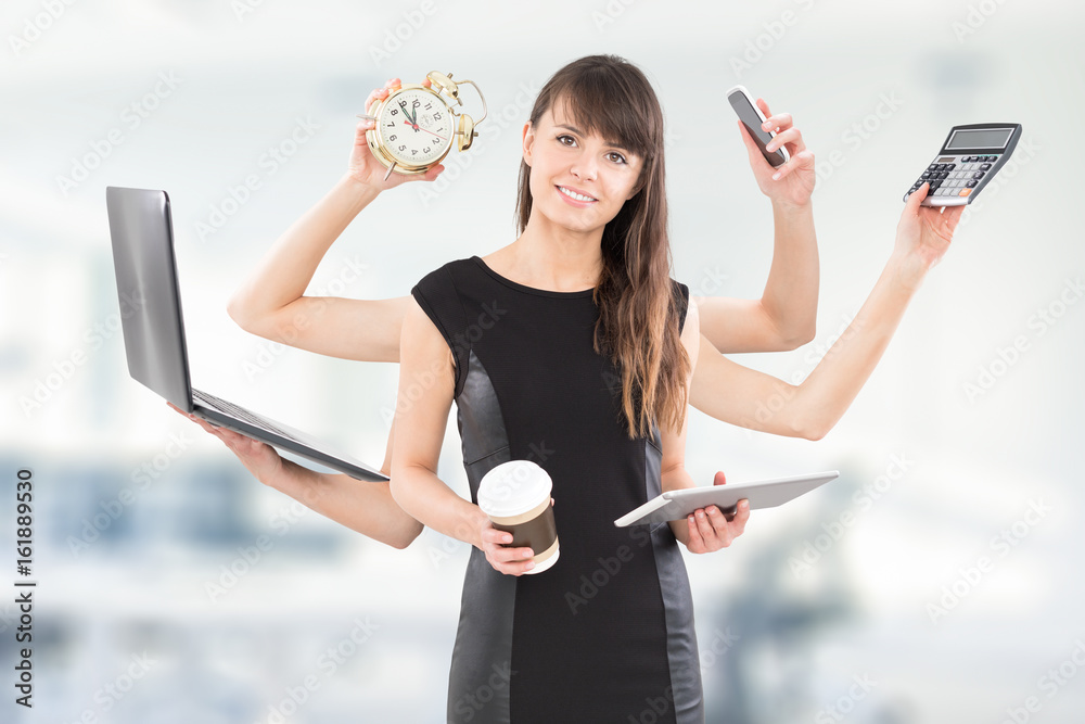 Multitask business woman with many hands. Stock Photo | Adobe Stock
