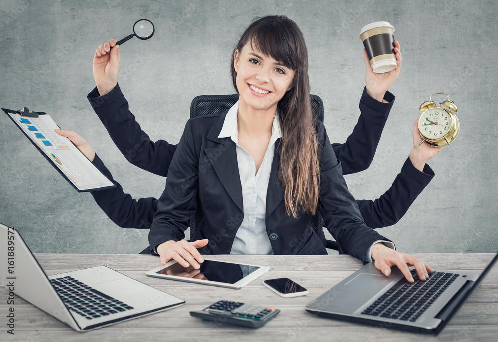 Multitask business woman with many hands. Stock Photo | Adobe Stock