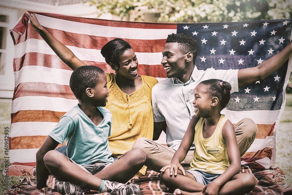 Happy family showing with USA flag Stock Photo | Adobe Stock