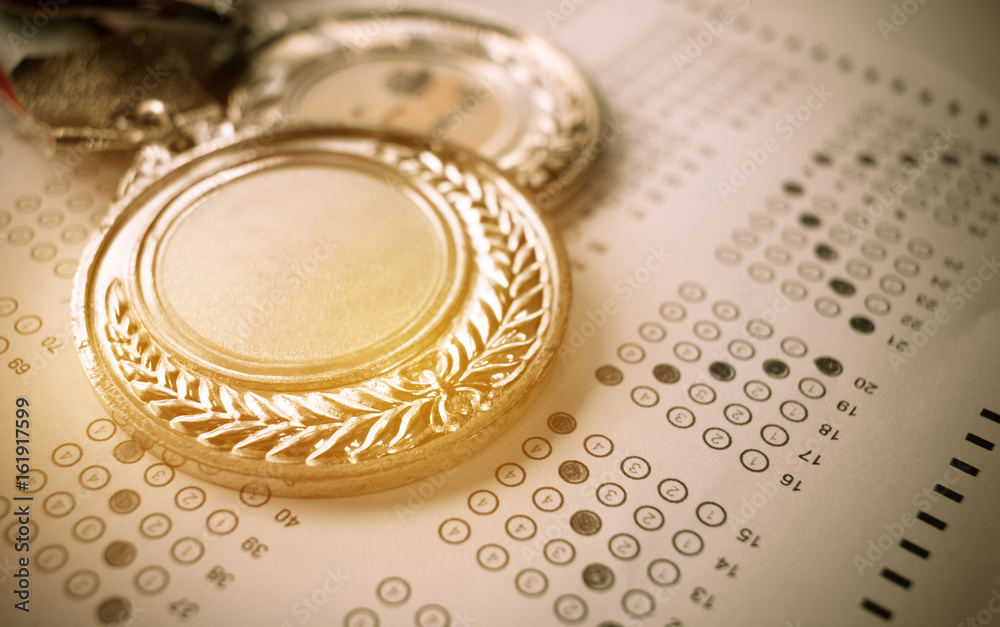 medals awards on exam test answer sheet, education and winner award ...