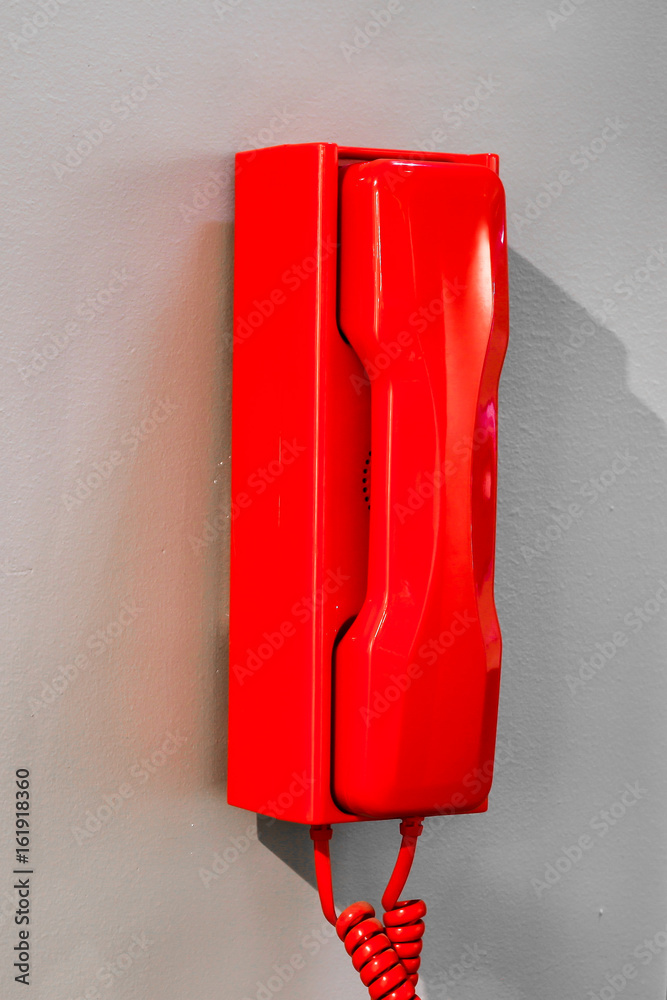 Emergency red telephone in an office building Stock Photo | Adobe Stock
