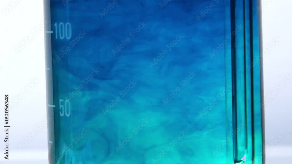 Close-up: chemical experiment and transformations inside a test tube or ...