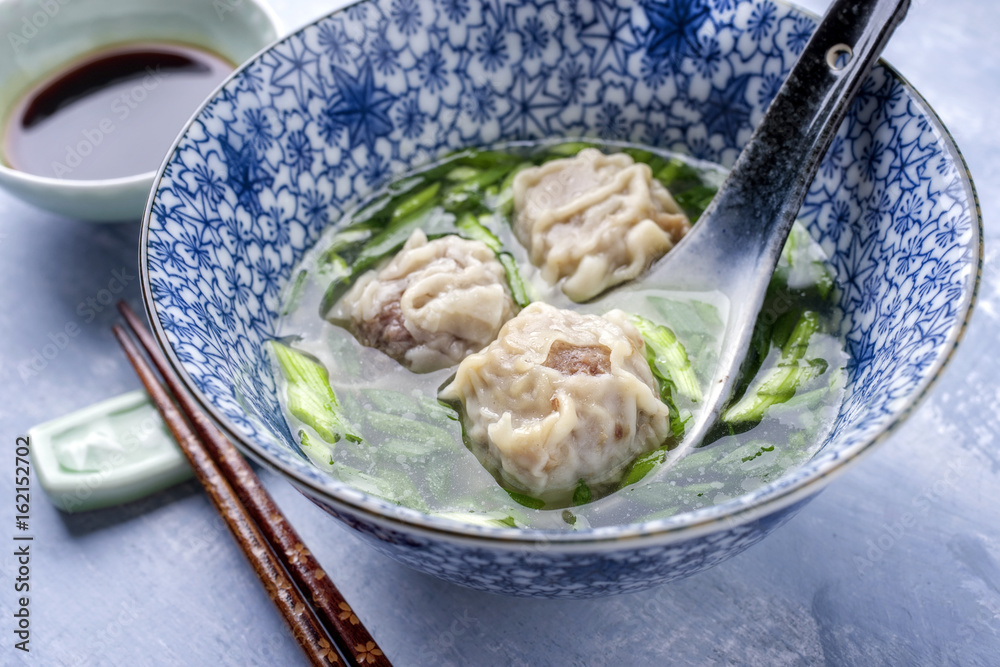 Traditional Chinese Wan Tan Soup as close-up in a bowl Stock Photo ...