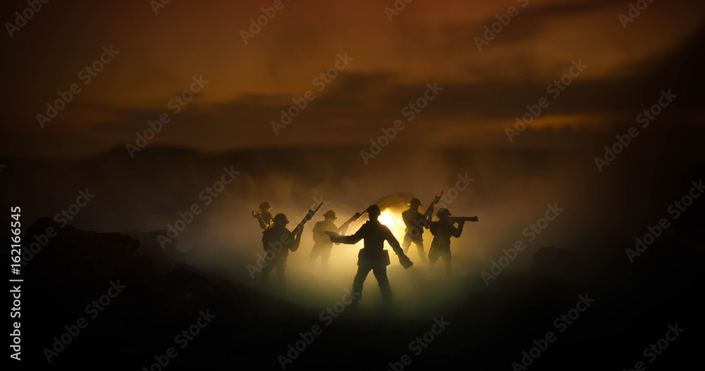 War Concept. Military silhouettes fighting scene on war fog sky ...