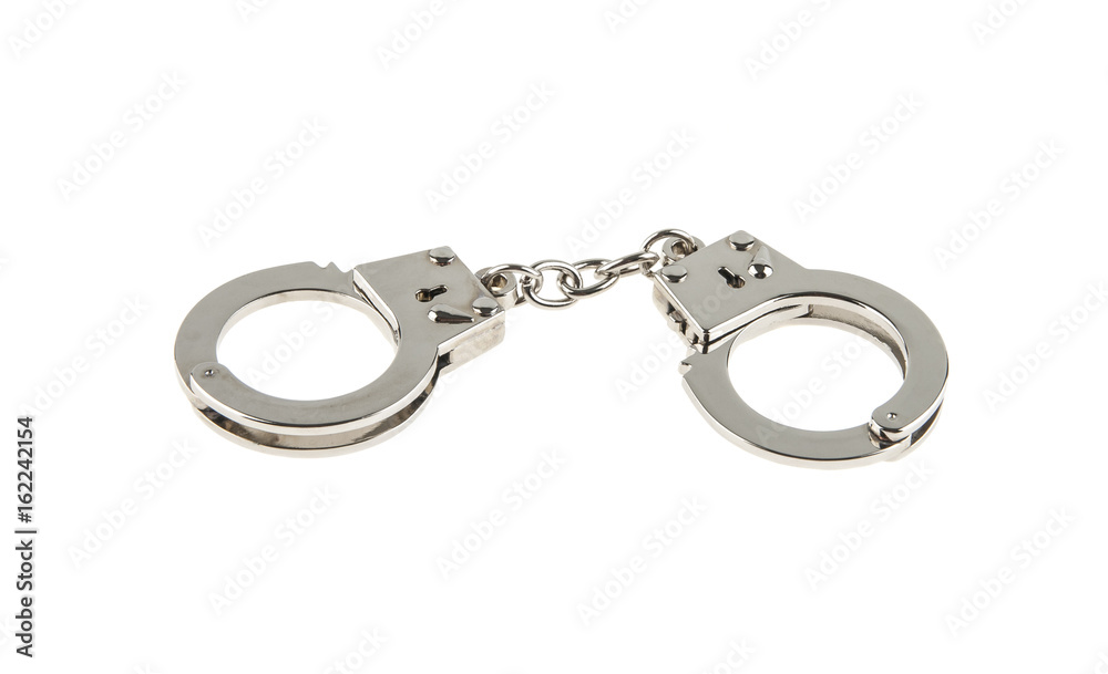 Iron handcuffs isolated on white background Stock Photo | Adobe Stock