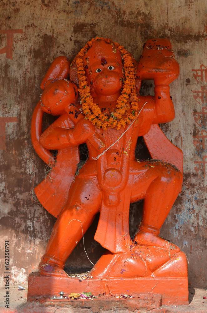 Orange Statue of Lord Hanuman, the Hindu Monkey Deity in Varanasi ...