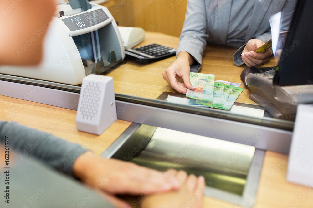 clerk counting cash money at bank office Stock Photo | Adobe Stock