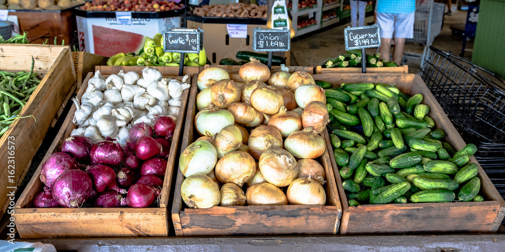 Vegetables on display at a produce stand Stock Photo | Adobe Stock