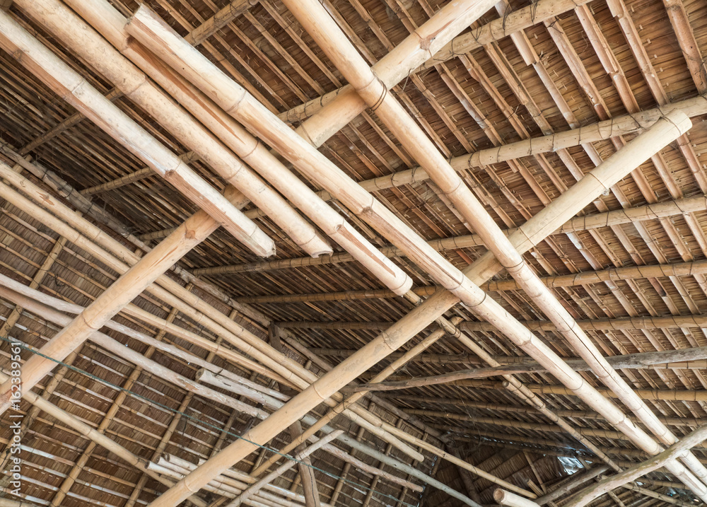 Thatch roof with the bamboo structure. Stock Photo | Adobe Stock