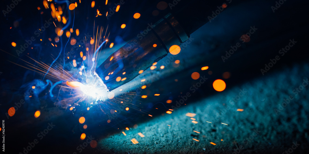 artistic welding sparks light, industrial background Stock Photo ...