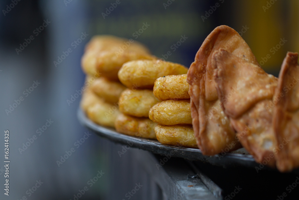 Indian street food. Samosa and potato balls Stock Photo | Adobe Stock