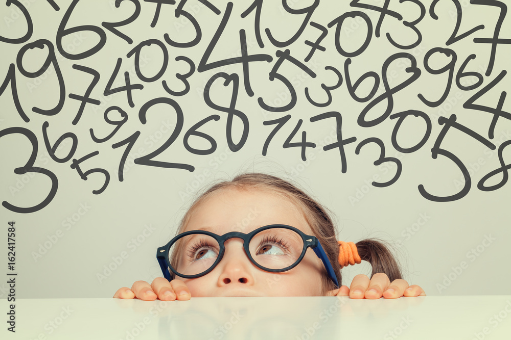 beautiful cute little girl with handwritten numbers above her head ...