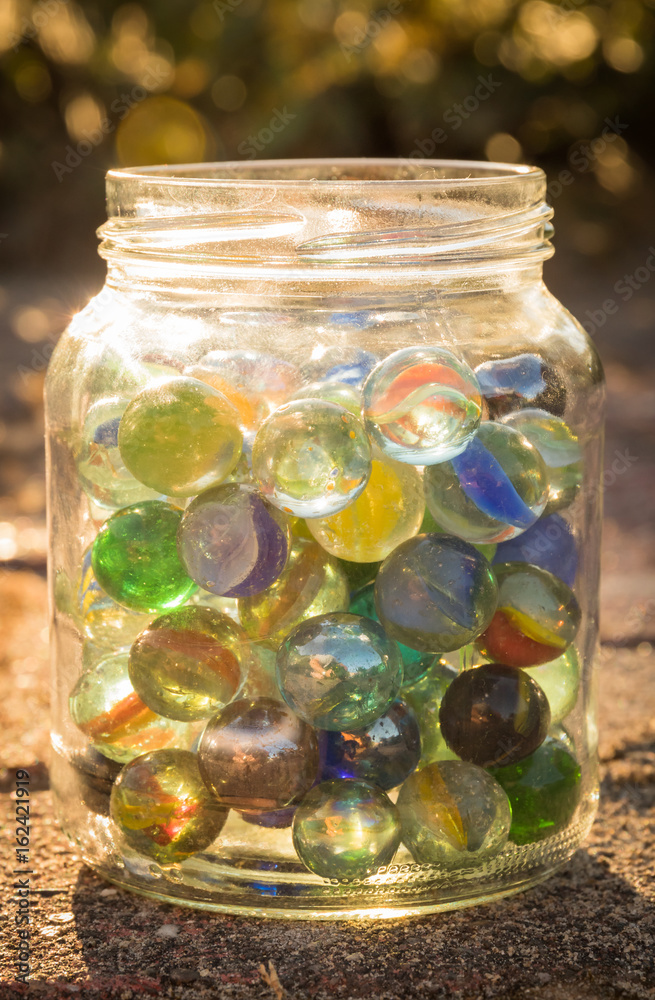 Colorful Marbles In A Jar