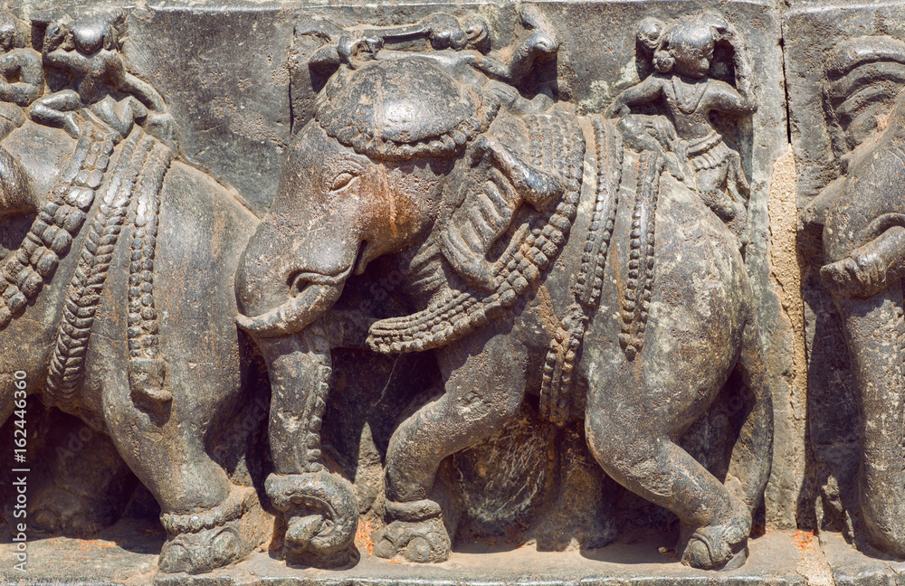 Elephants of Indian architecture background. Traditional style relief ...