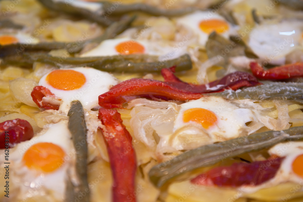 Street food in San Fermin feast, Pamlona, Navarra, Spain. Fried eggs ...