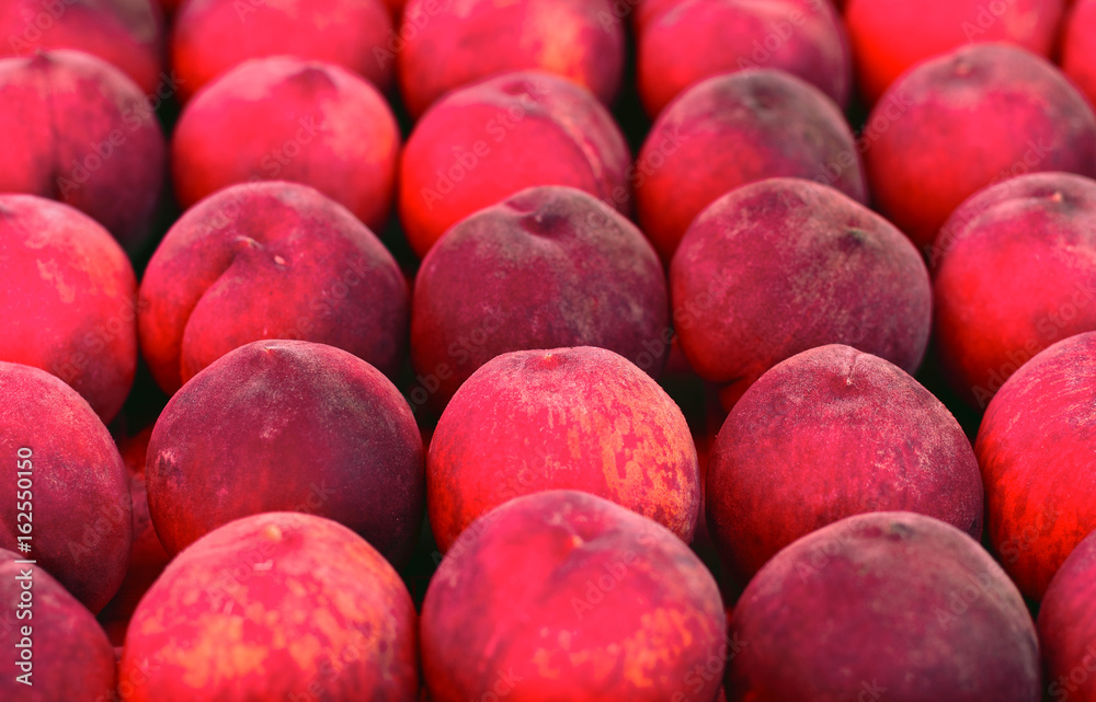 peaches Background. box filled with rows of fresh ripe red peaches for ...