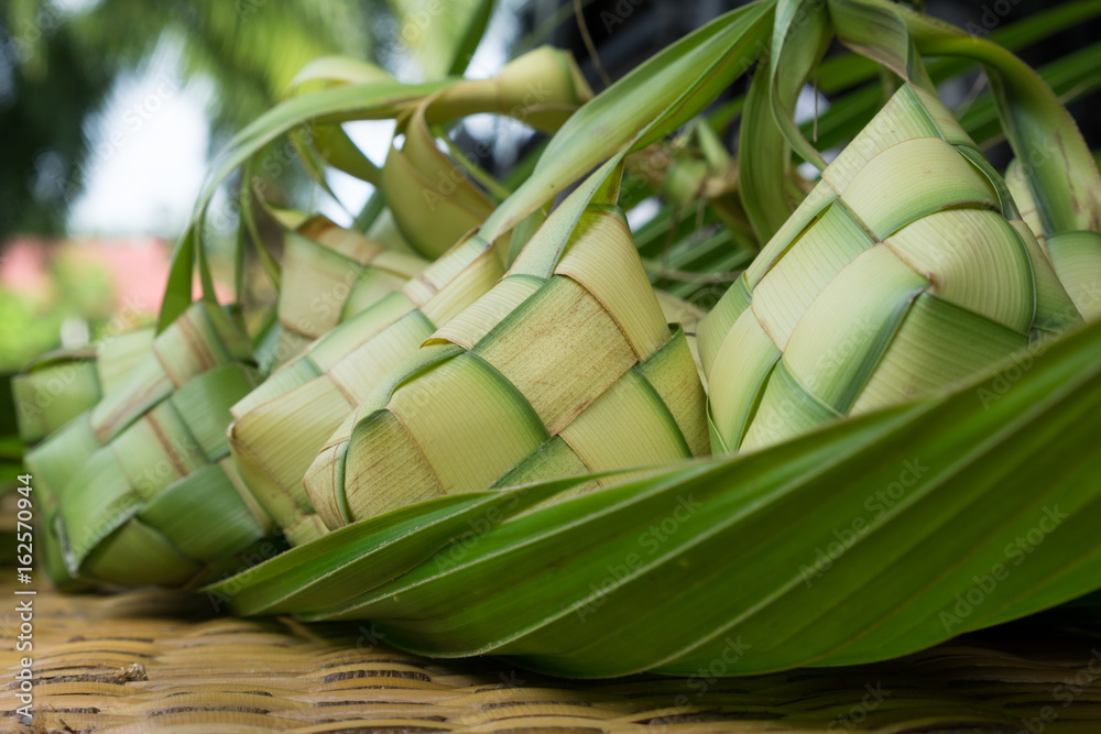 Ketupat, Kupat or Tipat is a type of dumpling made from rice packed ...