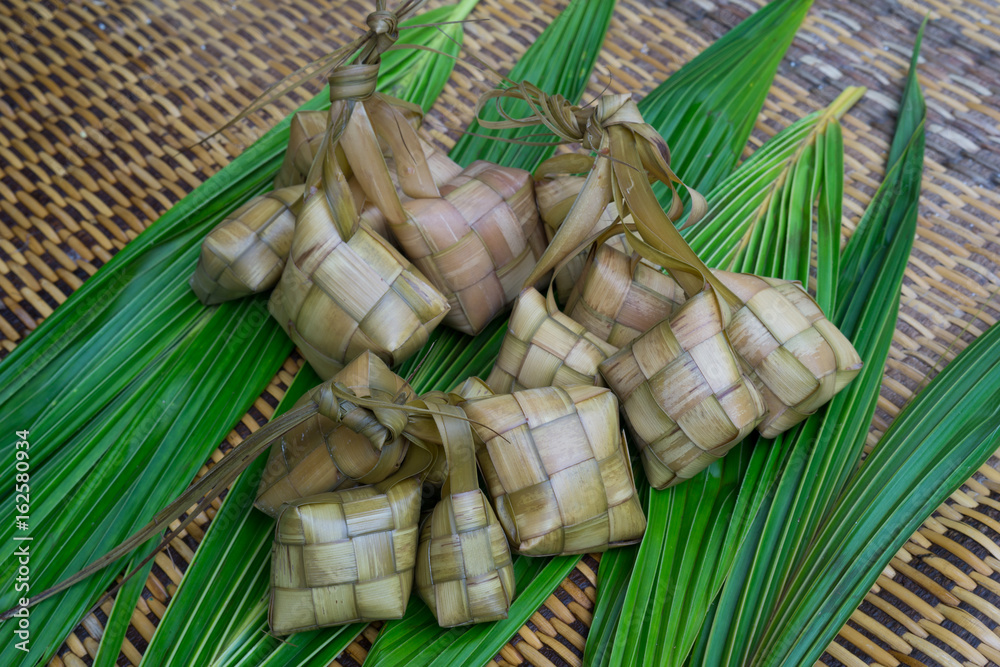 Ketupat, Kupat or Tipat is a type of dumpling made from rice packed ...