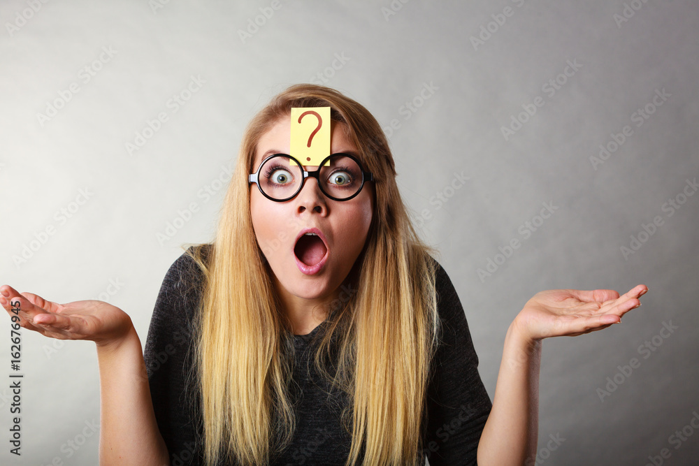 Weirdo nerd woman having question mark on forehead Stock Photo | Adobe ...