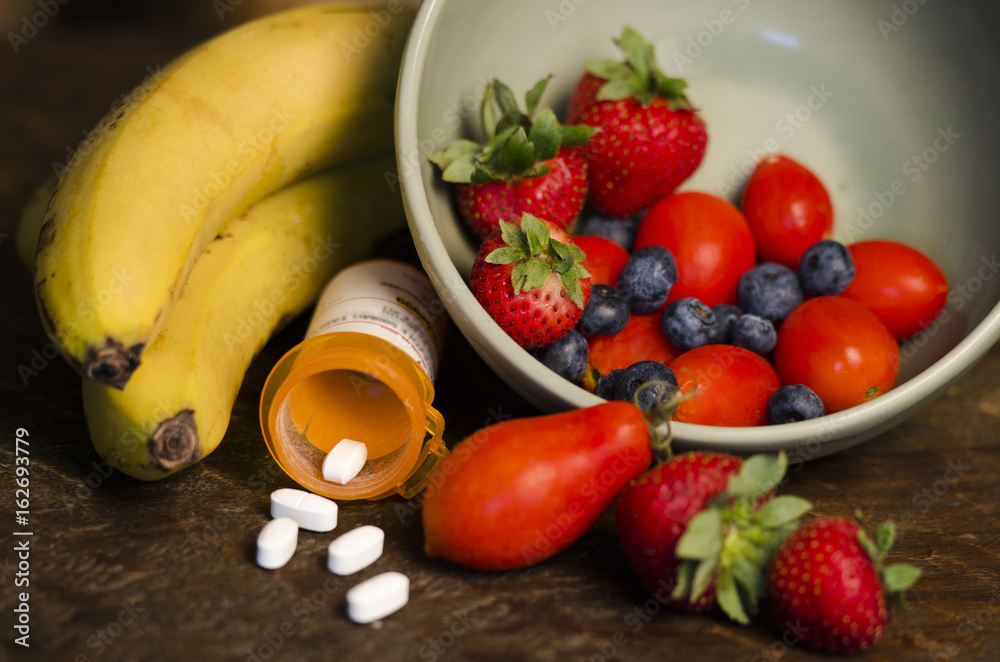 Fruit and medication as a way to a healthy lifestyle Stock Photo ...