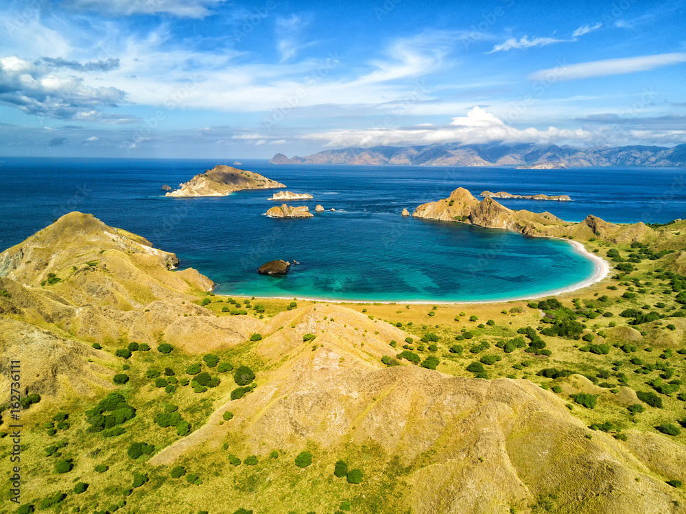 Aerial view of a small bay on Pulau Padar island in between Komodo and ...