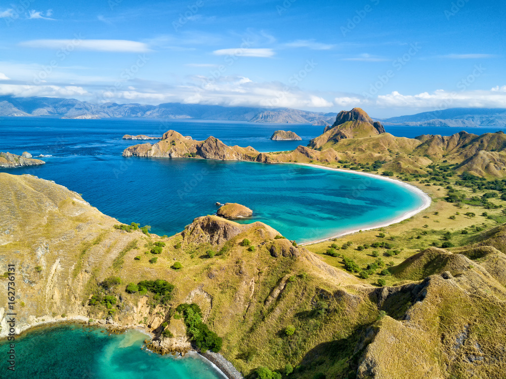 Aerial view of two beaches on Pulau Padar island in between Komodo and ...