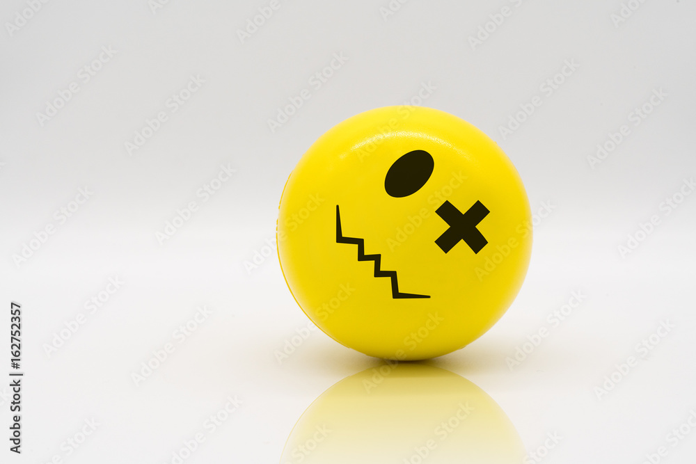 Yellow stress ball rolling on reflection floor Stock Photo | Adobe Stock
