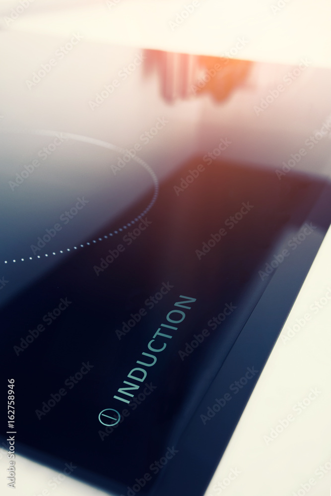 Induction symbol on electrical stove Stock Photo | Adobe Stock
