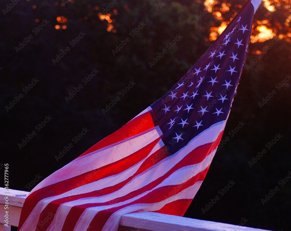 United States Flag Billowing in the Sunset Stock Photo | Adobe Stock