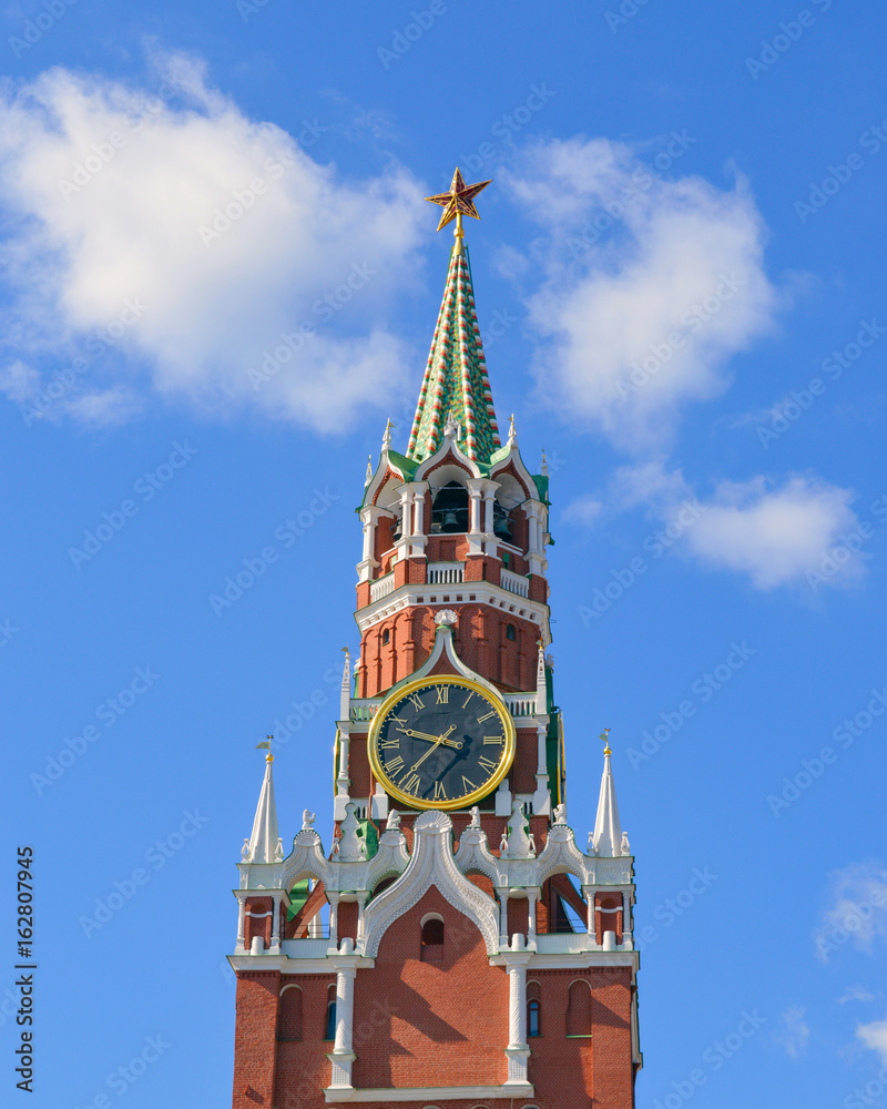 Striking clock on Spasskaya tower of Moscow Kremlin, symbol of Moscow ...