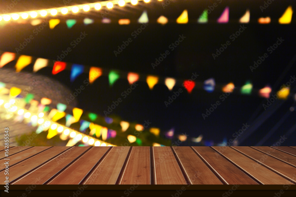 Wood table with blurred night market background : Decoration with ...