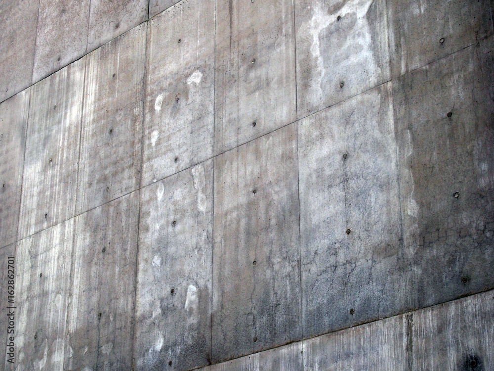 stained concrete wall with angular pattern and repeating marks Stock ...