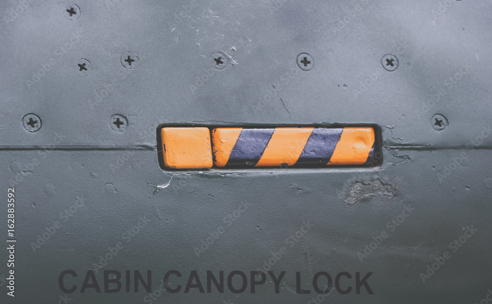 Metal surface from a jet fighter. fuselage of a airplane. with a cabin ...