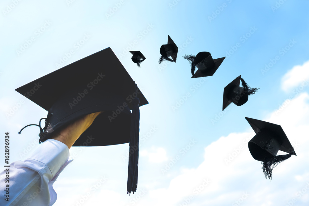 Graduation day, Images of hand holding Caps or hat throwing in the air ...