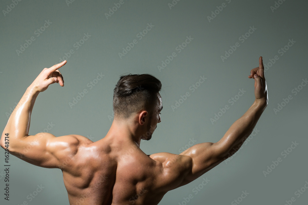 muscular man with muscle torso showing biceps and triceps Stock Photo ...