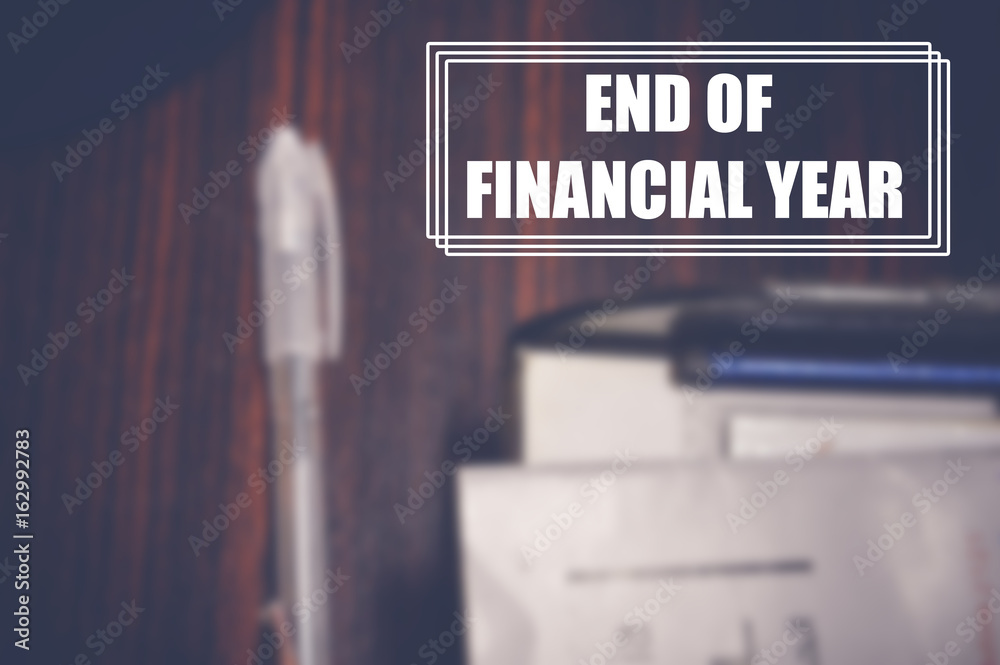End of financial year with blurring business office background Stock ...