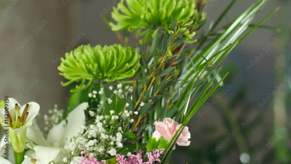 Flower bouquet in the rays of light, rotation, the floral composition ...