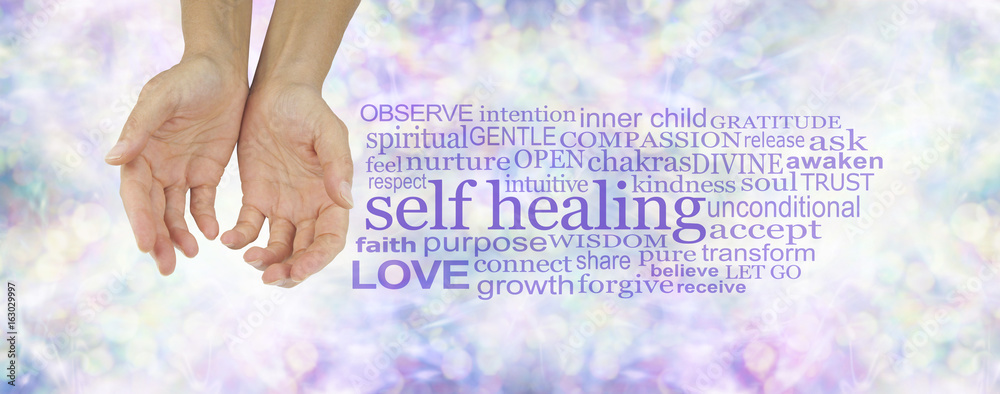 Heal Thyself - female hands in cupped position on a pastel multicolored ...