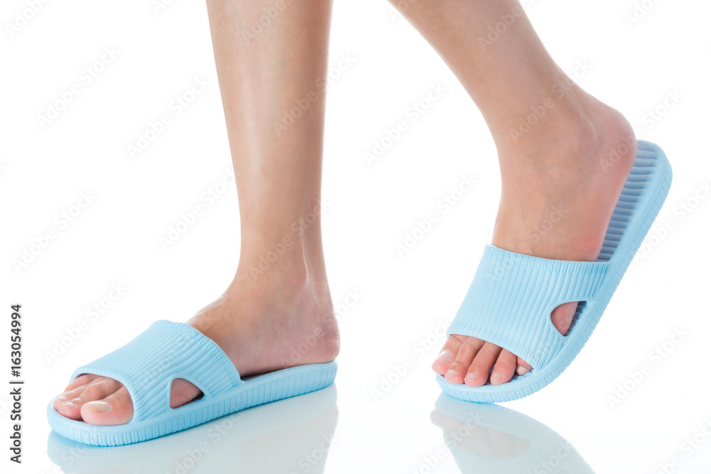 Woman feet wearing beautiful blue sandal step with side view on white ...