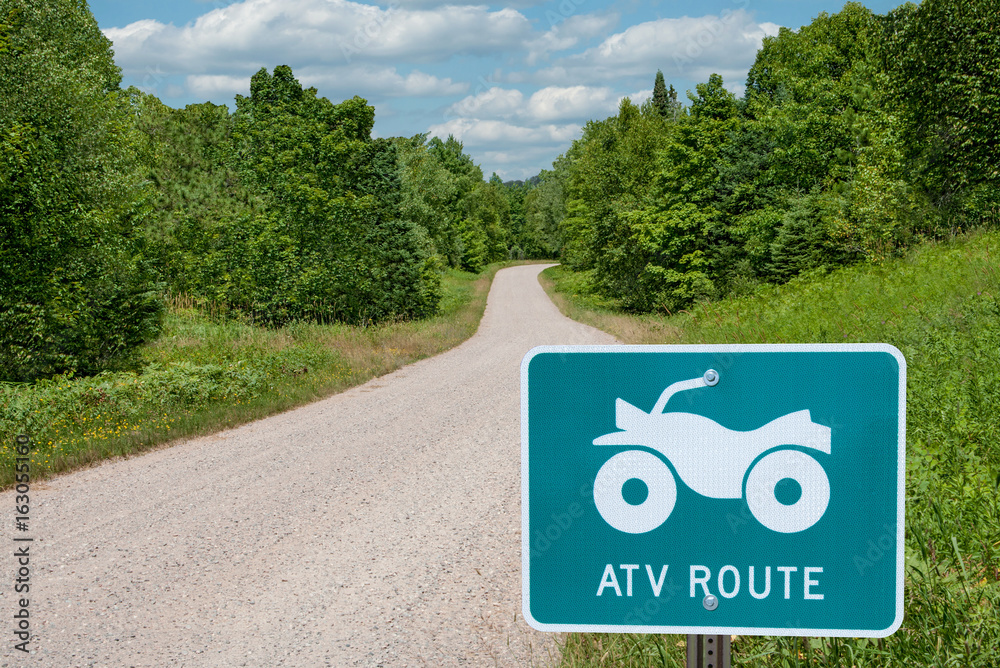 ATV Route: A road sign identifies a route for all-terrain vehicles in ...